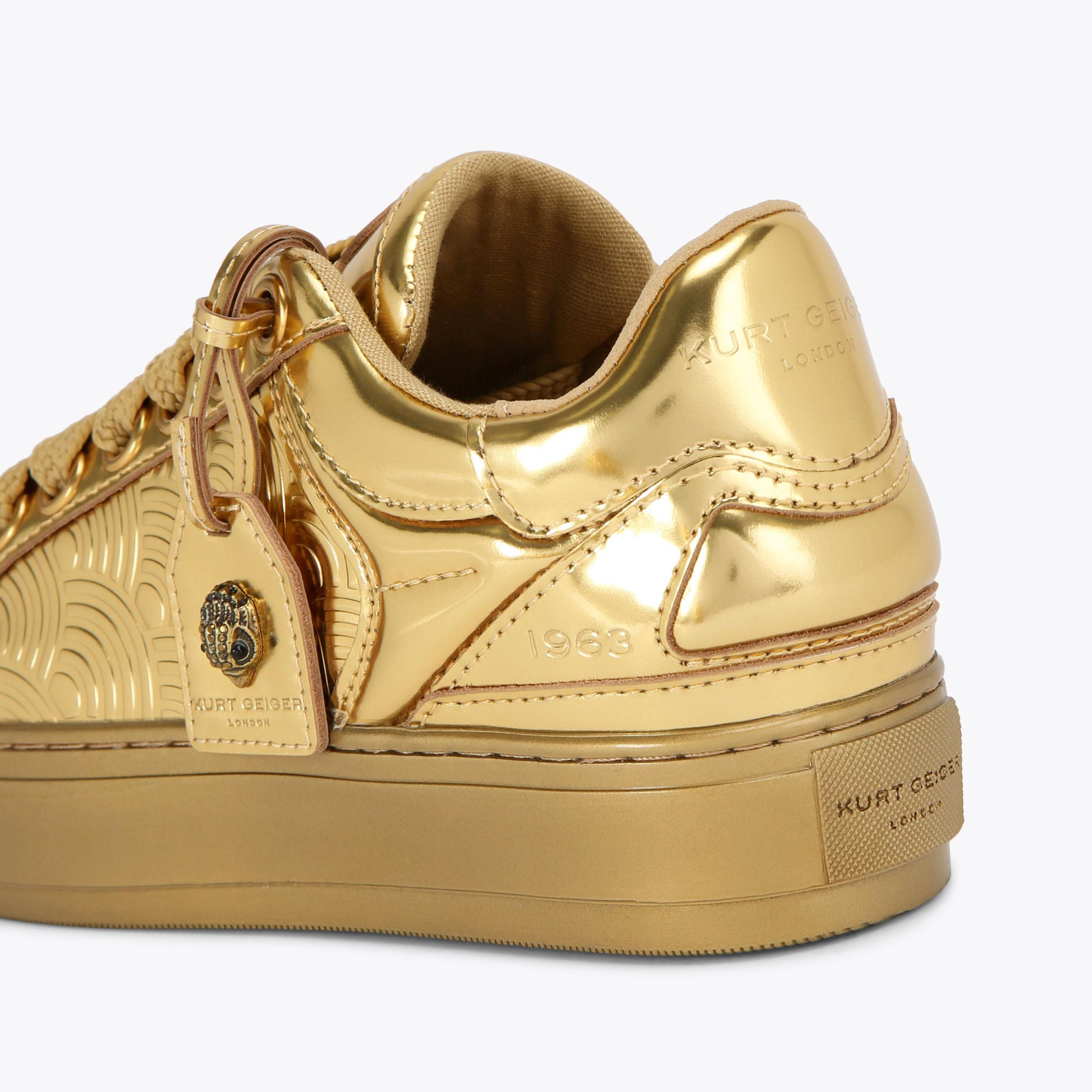 SOUTHBANK TAG Metallic Gold Sneaker by KURT GEIGER LONDON