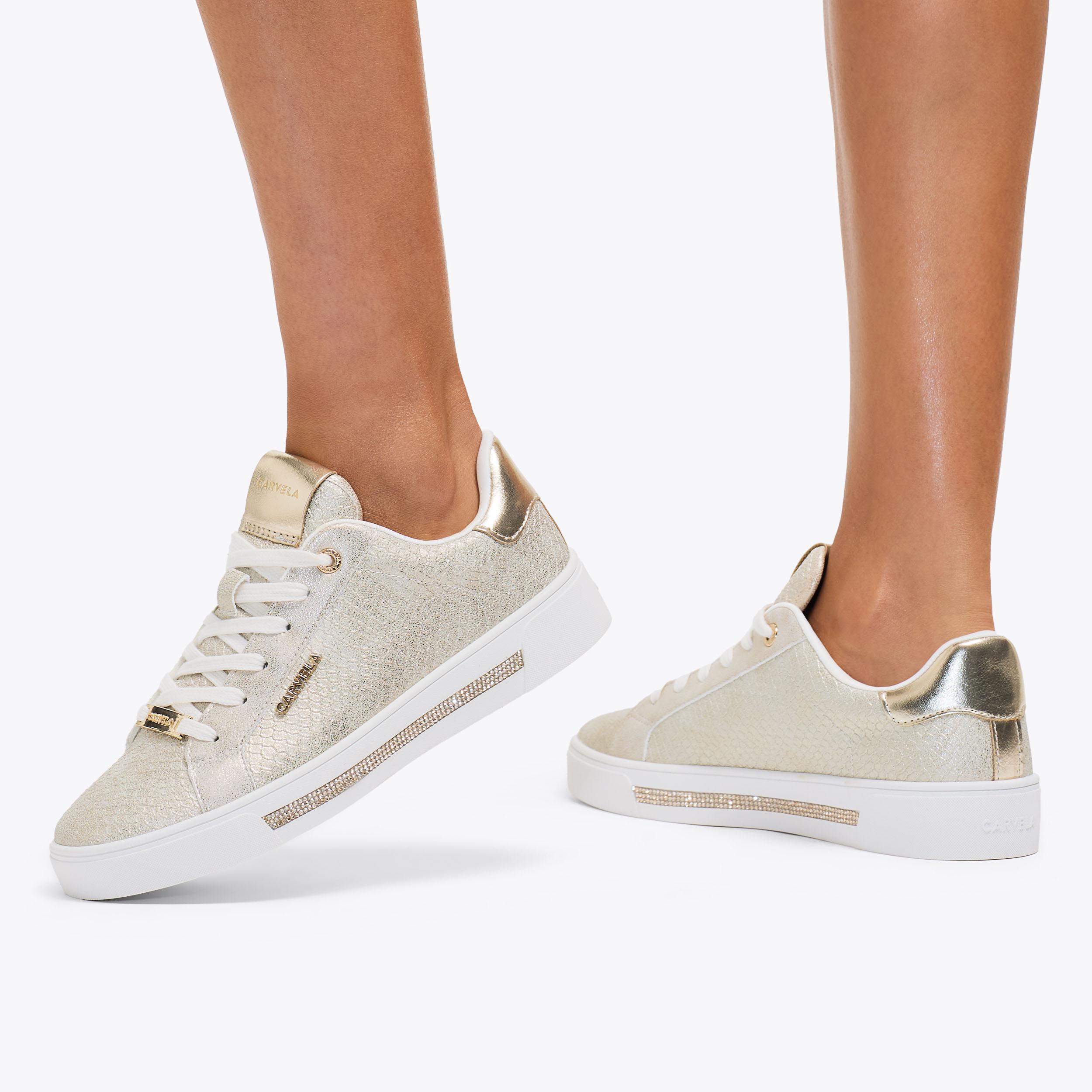 DIAMOND Gold Snake Print Trainer by CARVELA
