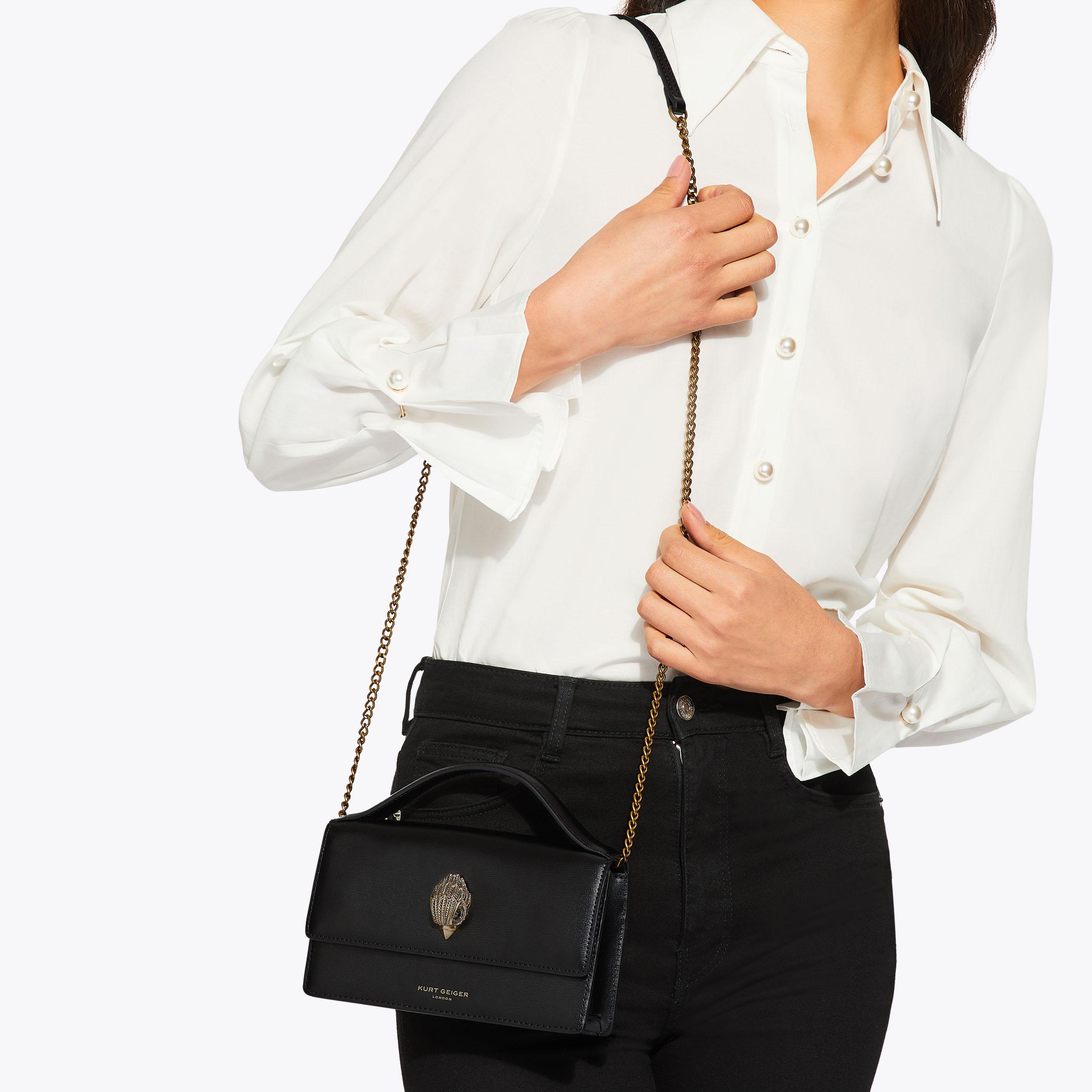 SM BOND TOP HANDLE BAG Black Top Handle Bag by KURT GEIGER LONDON