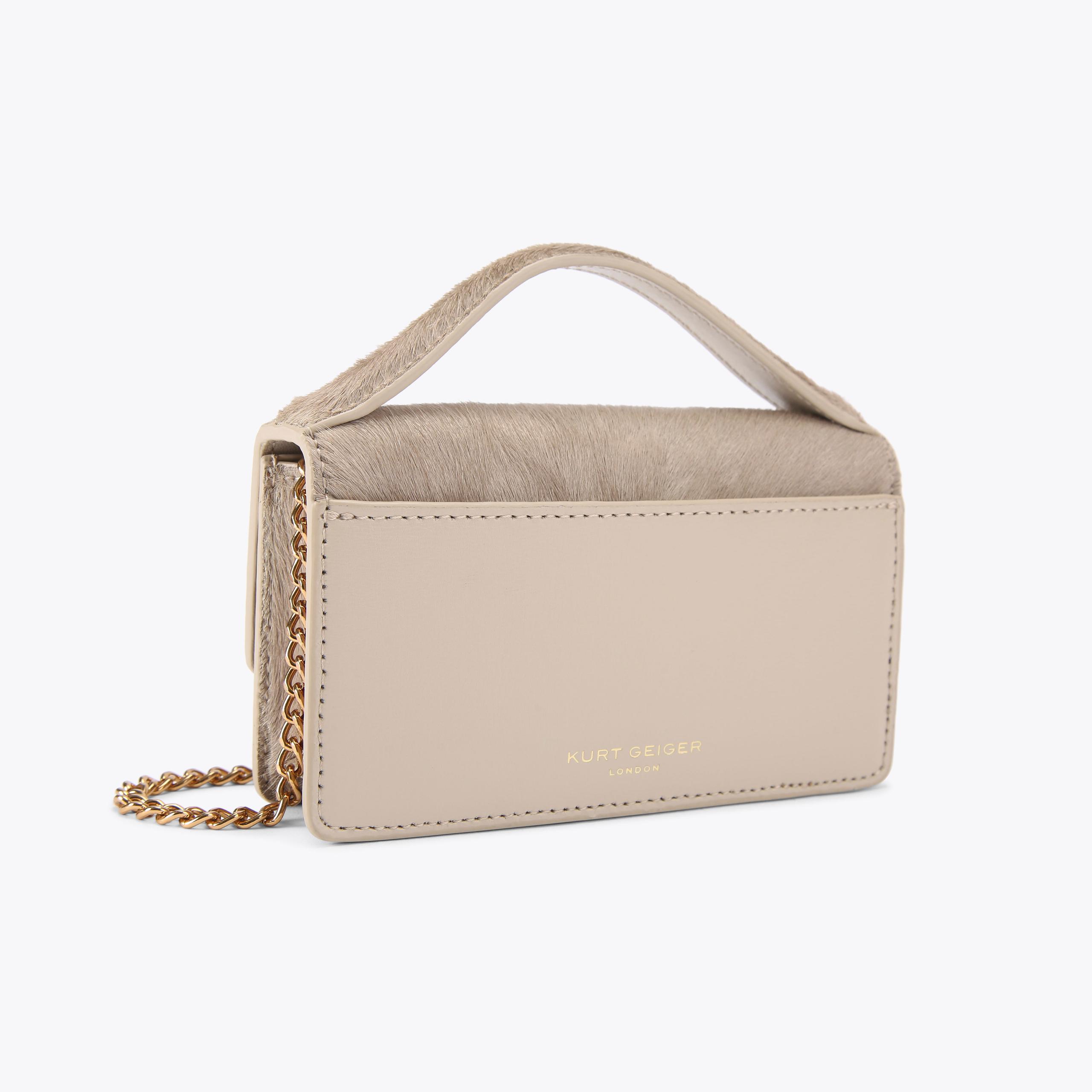 XS BOND TOP HANDLE BAG Calf Hair Top Handle Bag by KURT GEIGER LONDON