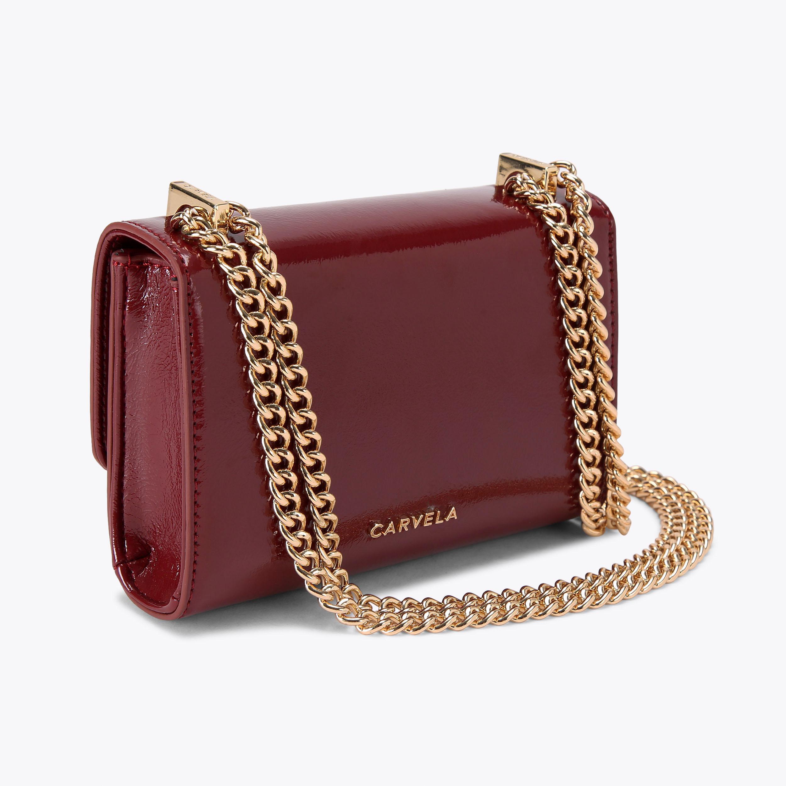 VICTORIA MINI TASSEL Red Tassel Cross Body Bag by CARVELA