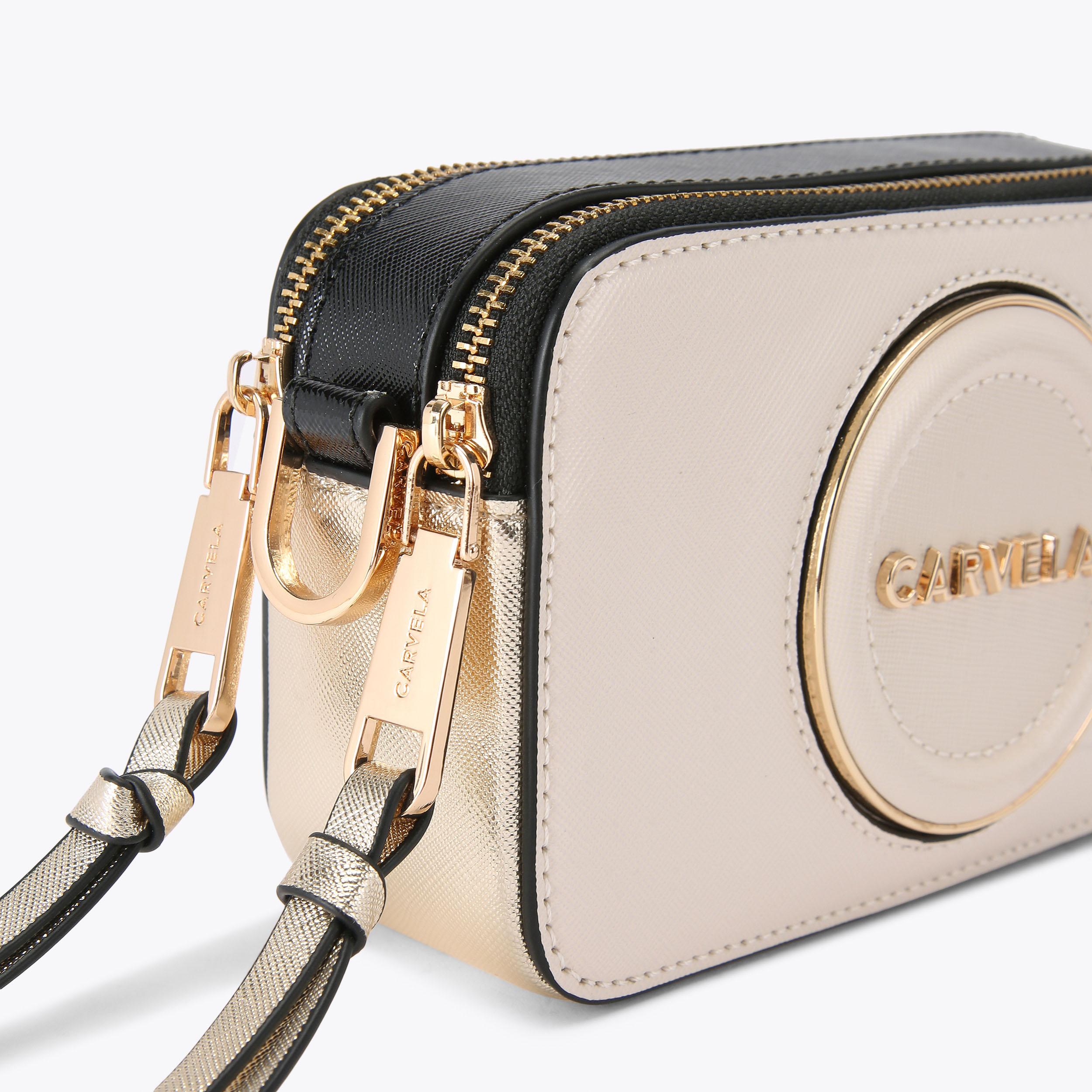 MINI ROMA CIRCLE Bone Camera Bag by CARVELA