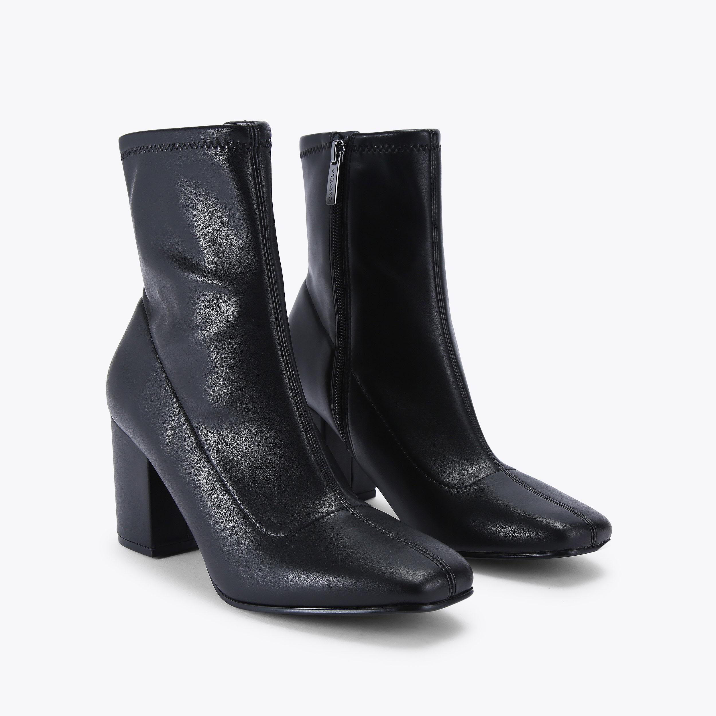 STRUT ANKLE Black Ankle Boot by CARVELA