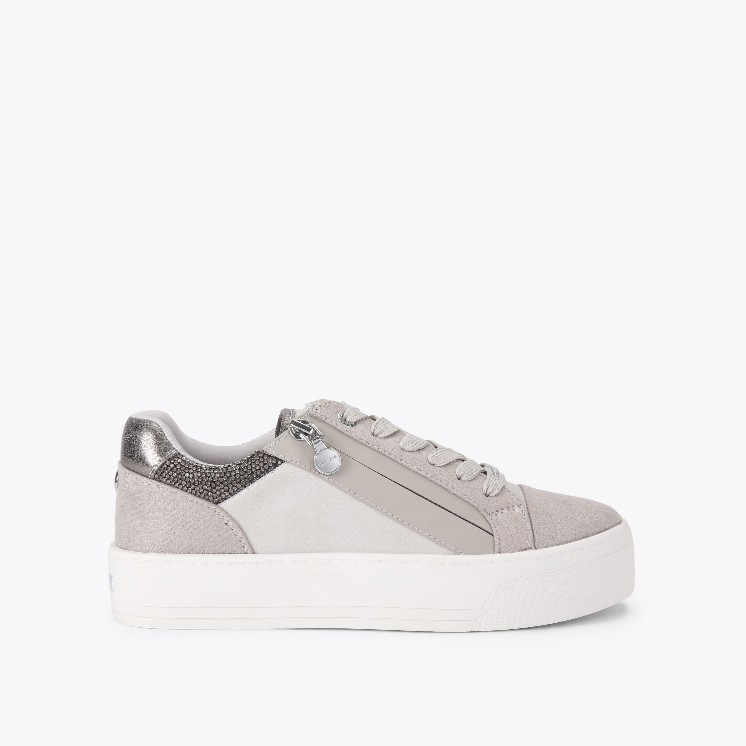 STATEMENT ZIP Zebra Textured Sneaker by CARVELA