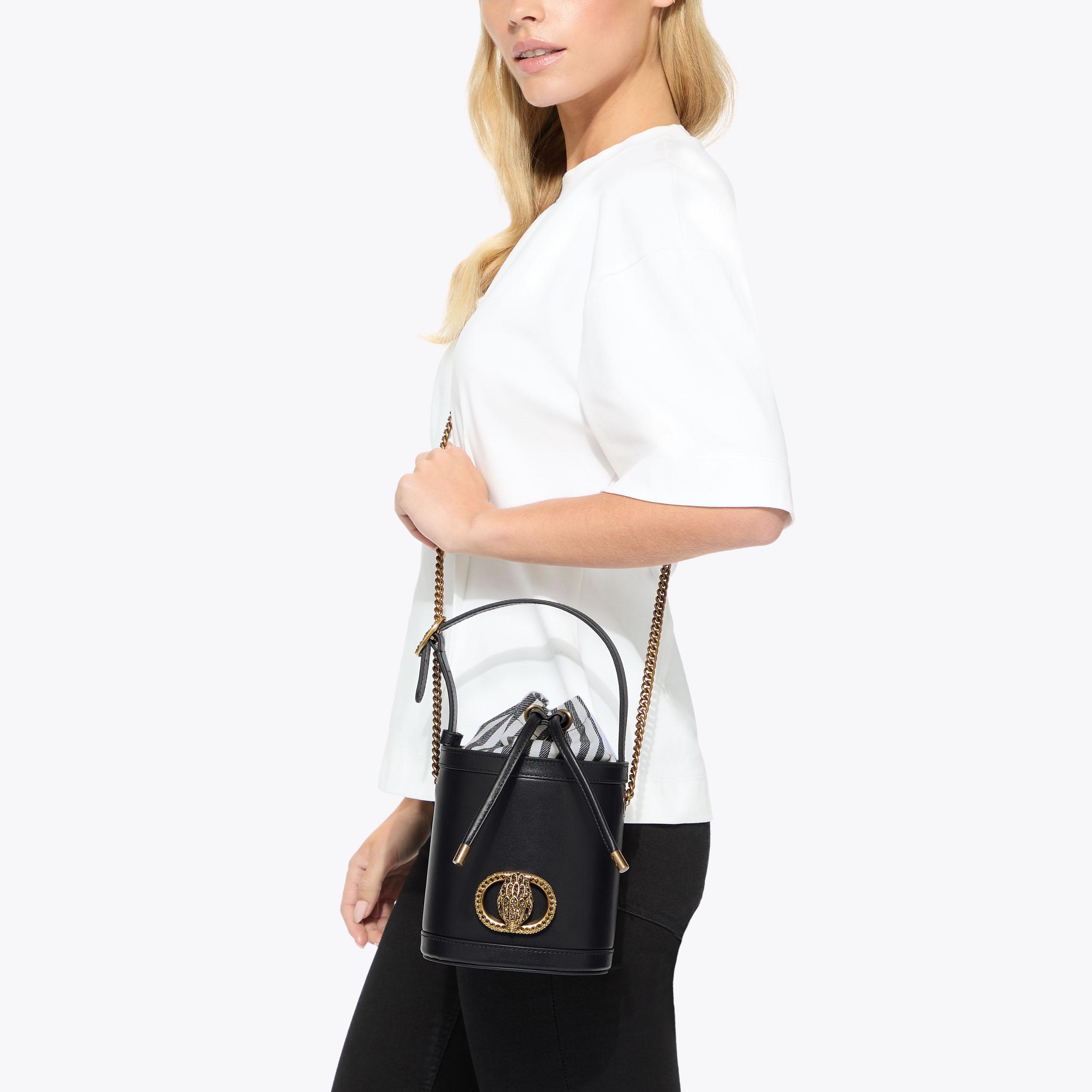 SM CHELSEA ROUND BUCKET Black Bucket Bag by KURT GEIGER LONDON