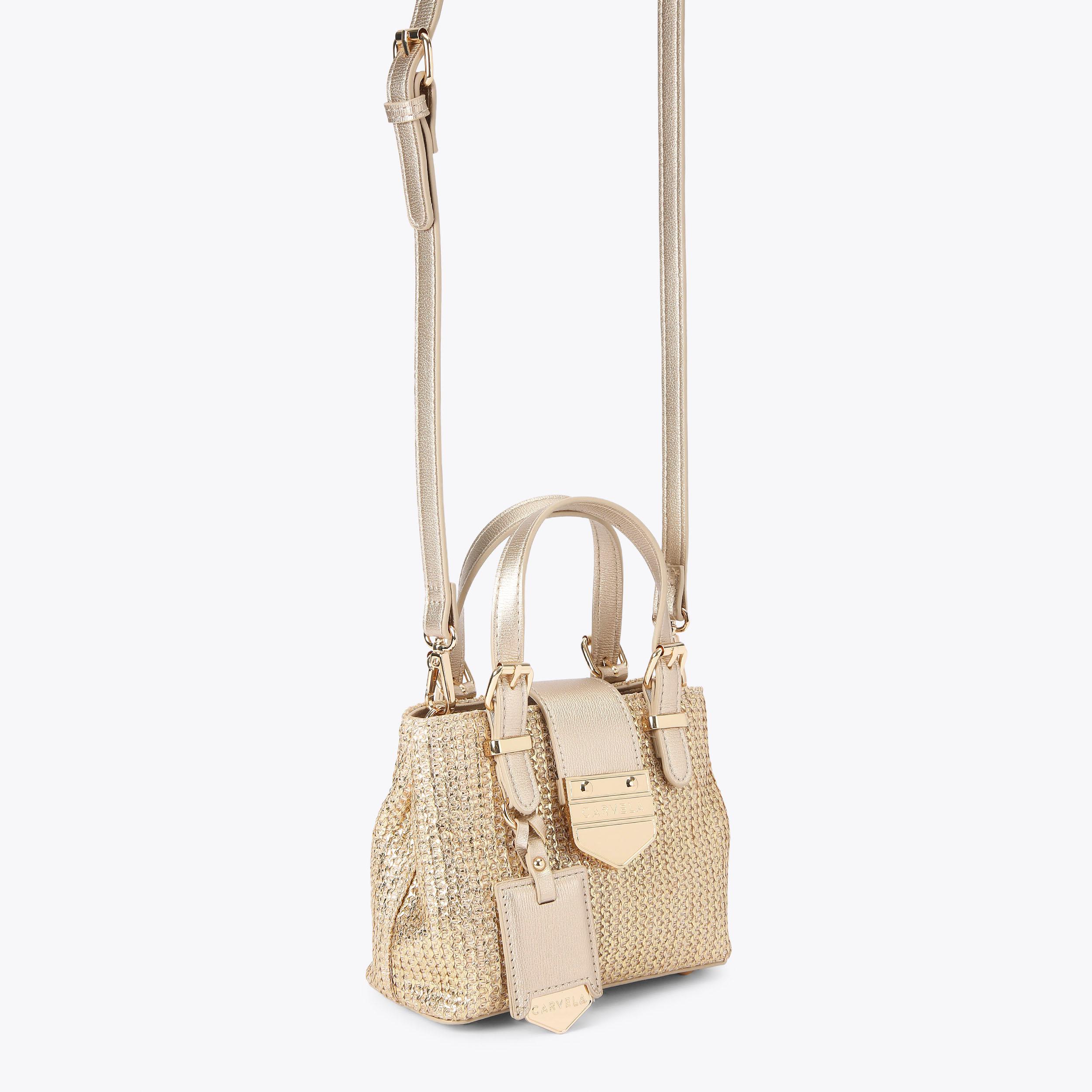 MARIA MICRO TOTE Metallic Gold Synthetic Micro Tote Bag by CARVELA
