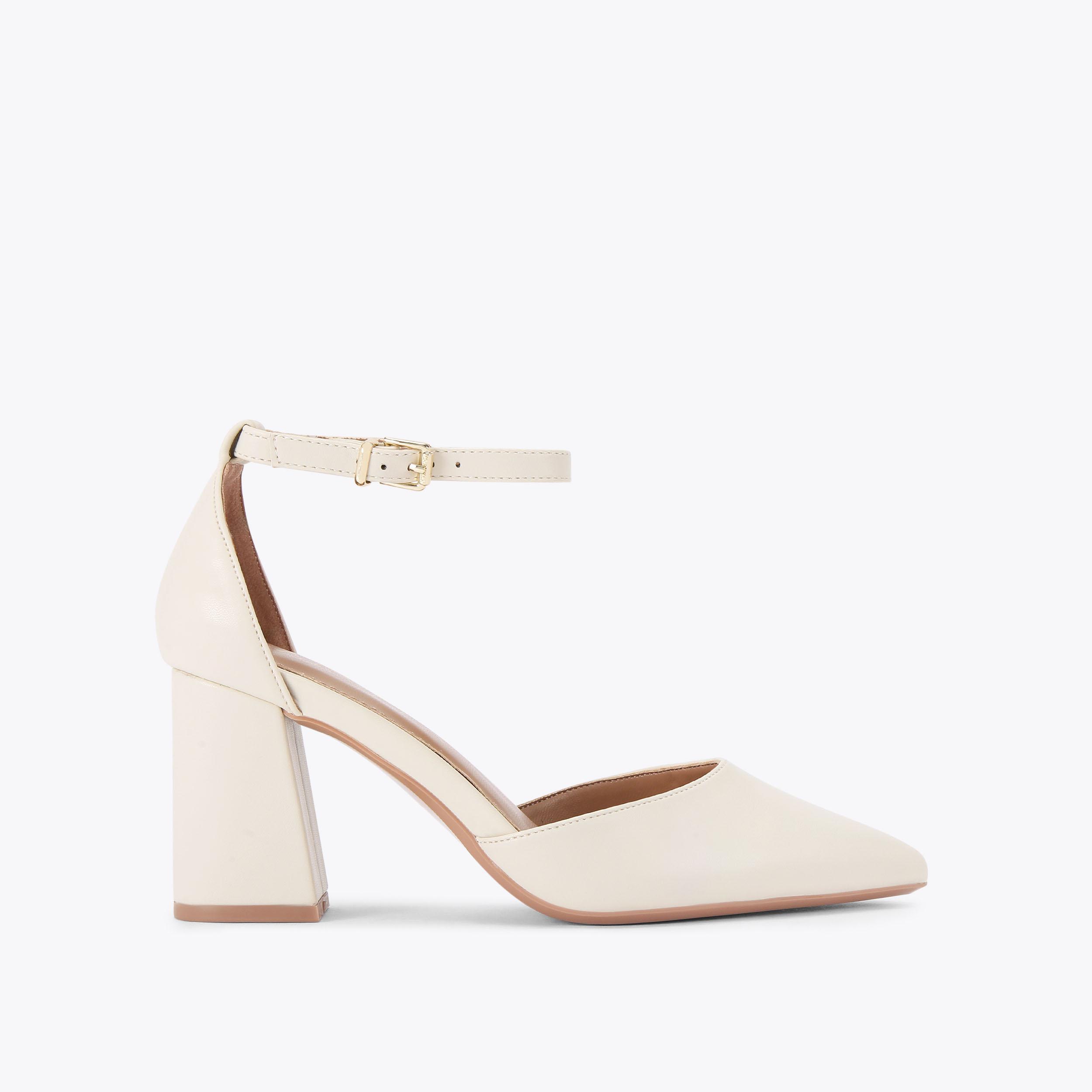 REFINED COURT Bone Block Heel by CARVELA