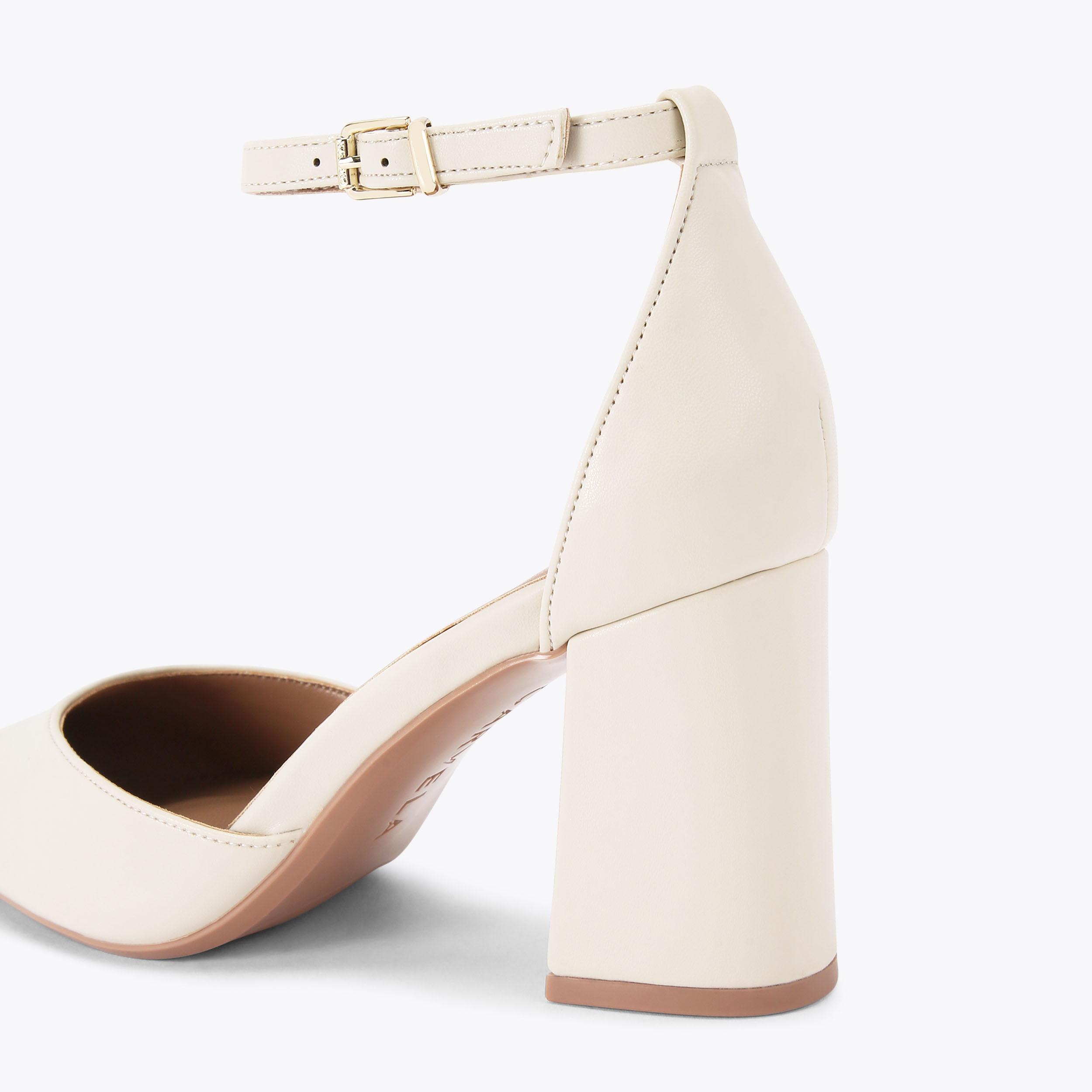 REFINED COURT Bone Block Heel by CARVELA