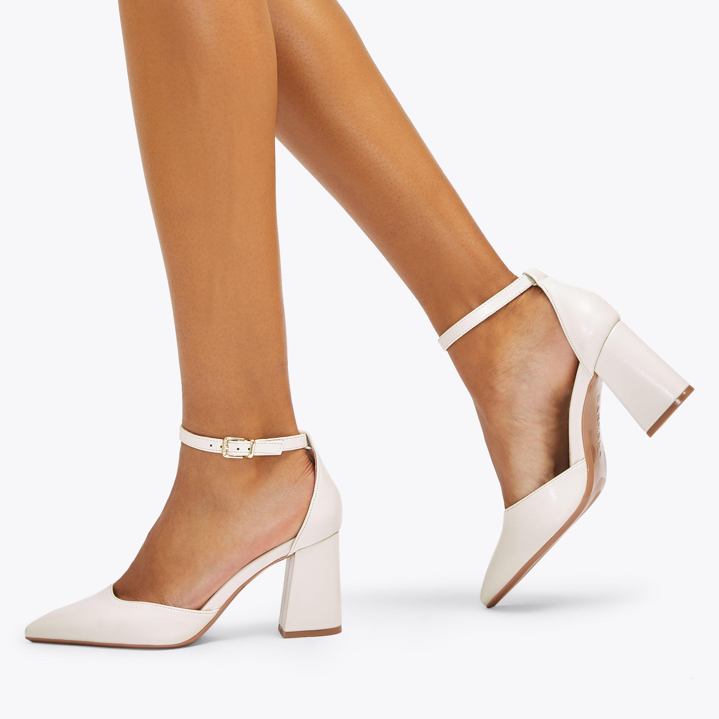 REFINED COURT Bone Block Heel by CARVELA