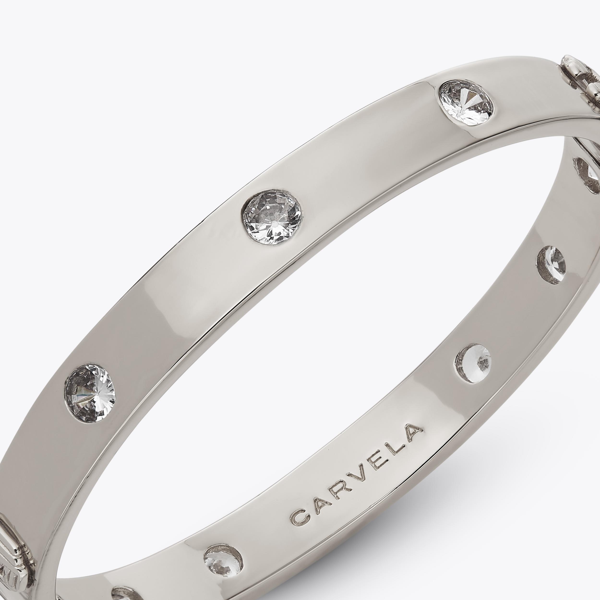 SIGNATURE BANGLE Silver Structured Crystal Bangle Bracelet by CARVELA